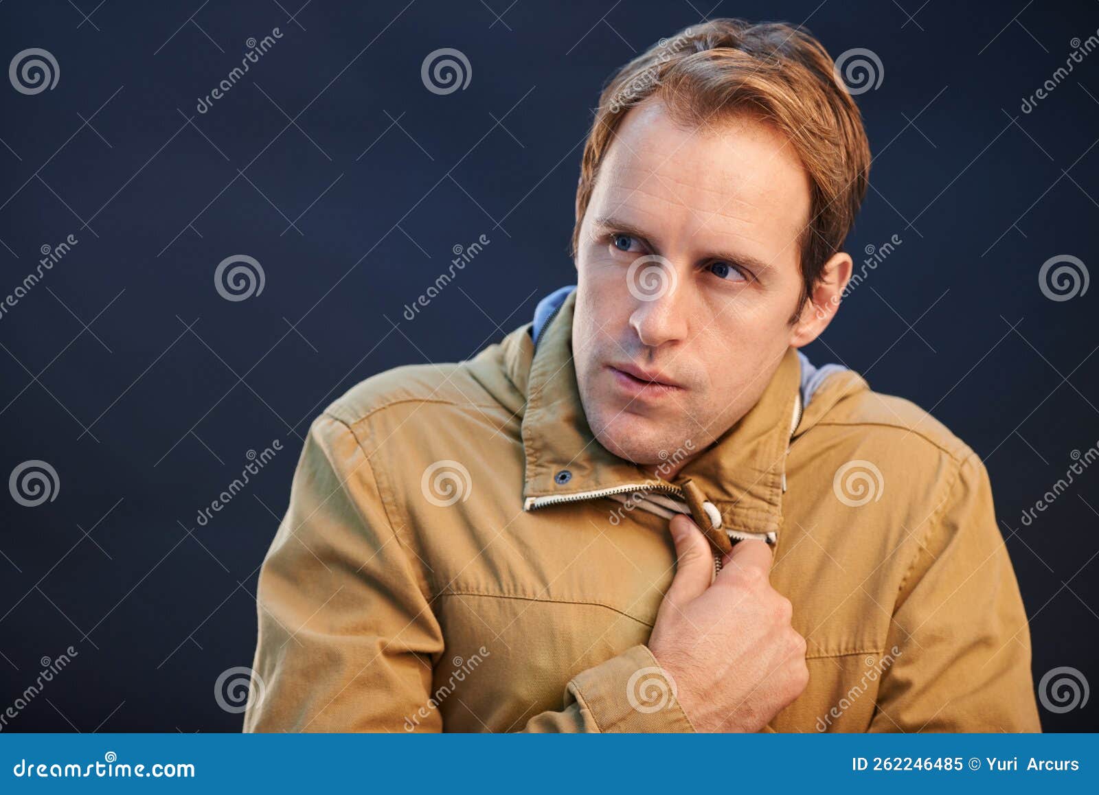 Feeling the Chill. a Man Pulling His Jacket Closed. Stock Image - Image ...