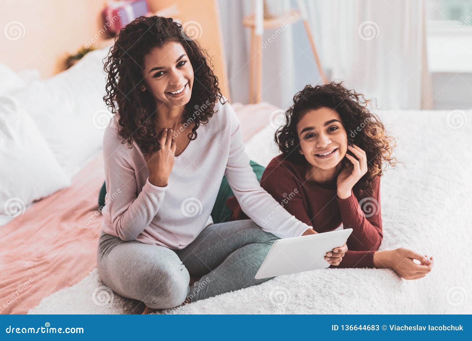 Two Appealing Sisters Feeling Delightful while Spending Free Time Stock ...