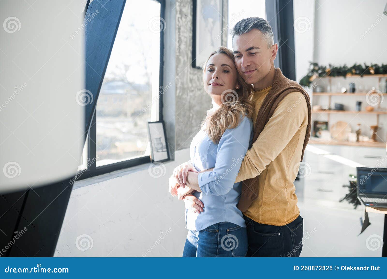 A Happy Couple Standing Together and Hugging Stock Image - Image of ...