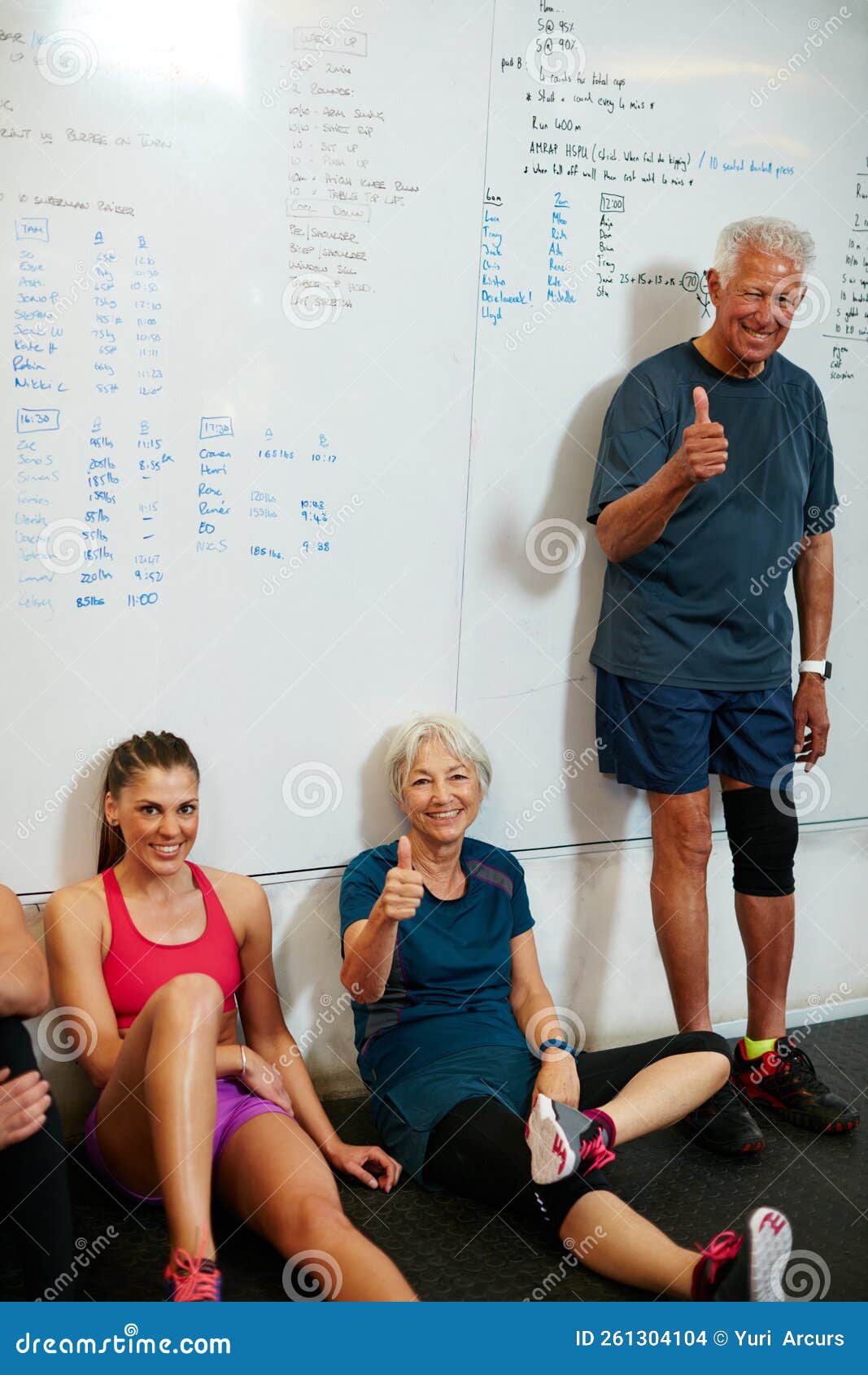 Feeling Good after a Workout. a Group of People Chilling at the Gym ... Feeling Good after a Workout. a Group of People Chilling at the Gym ...
