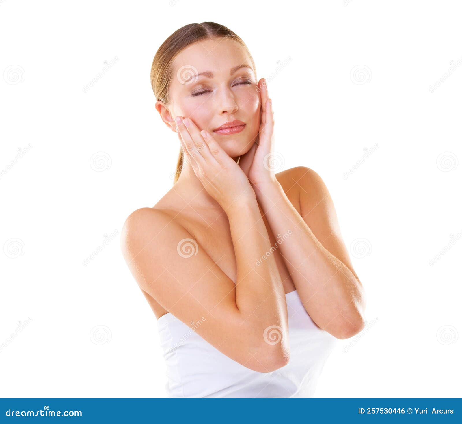 Feeling the Softness. Studio Shot of a Young Model Touching Her Face on ...