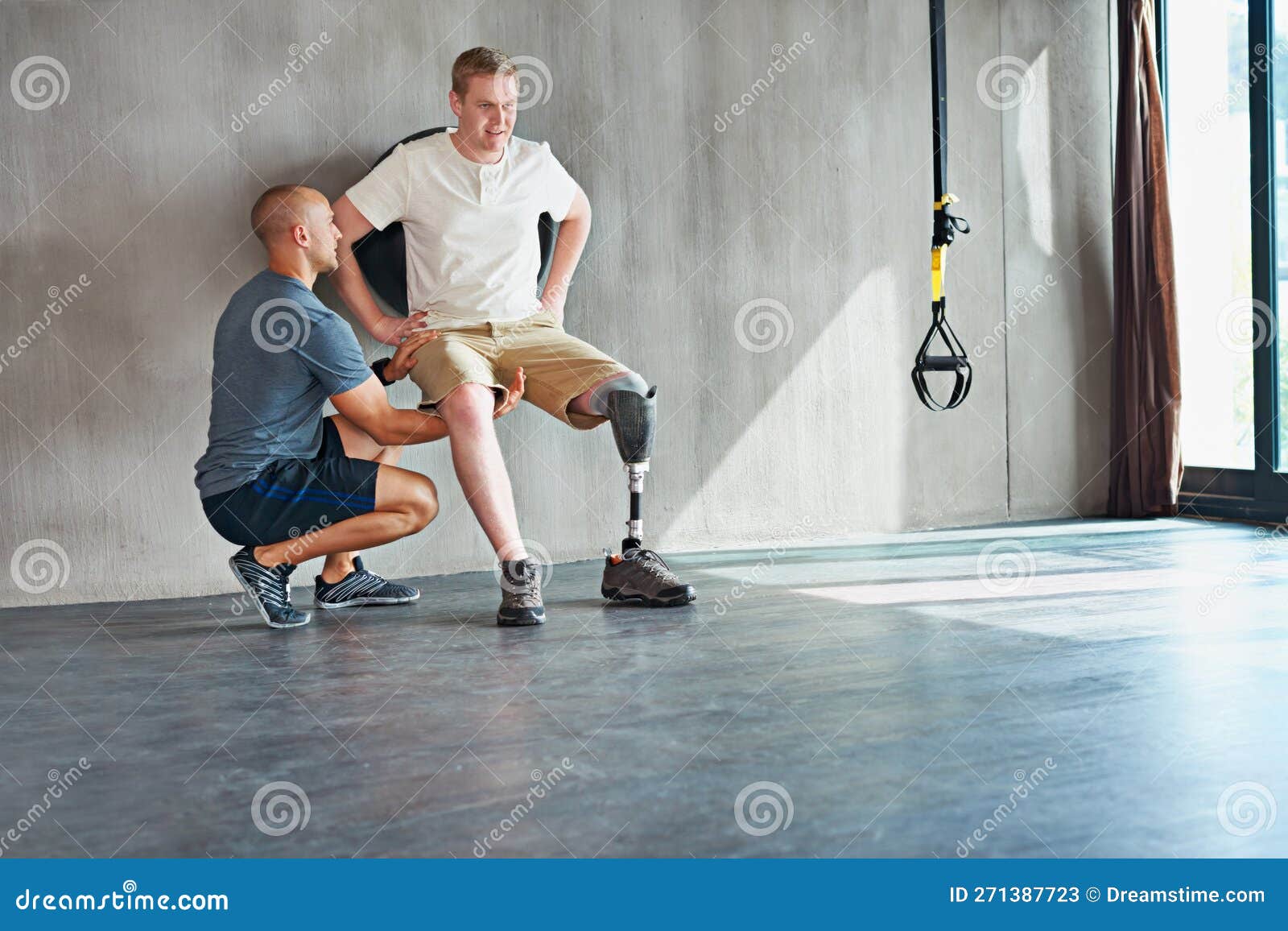 Feeling Stable yet. Studio Shot of a Young Amputee Training in a Gym ...