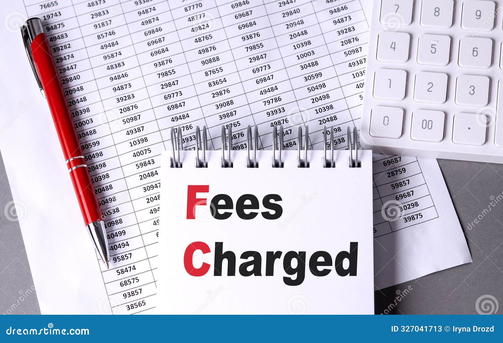FEES CHARGED Text on Notebook with Chart , Pen and Calculator Stock ...