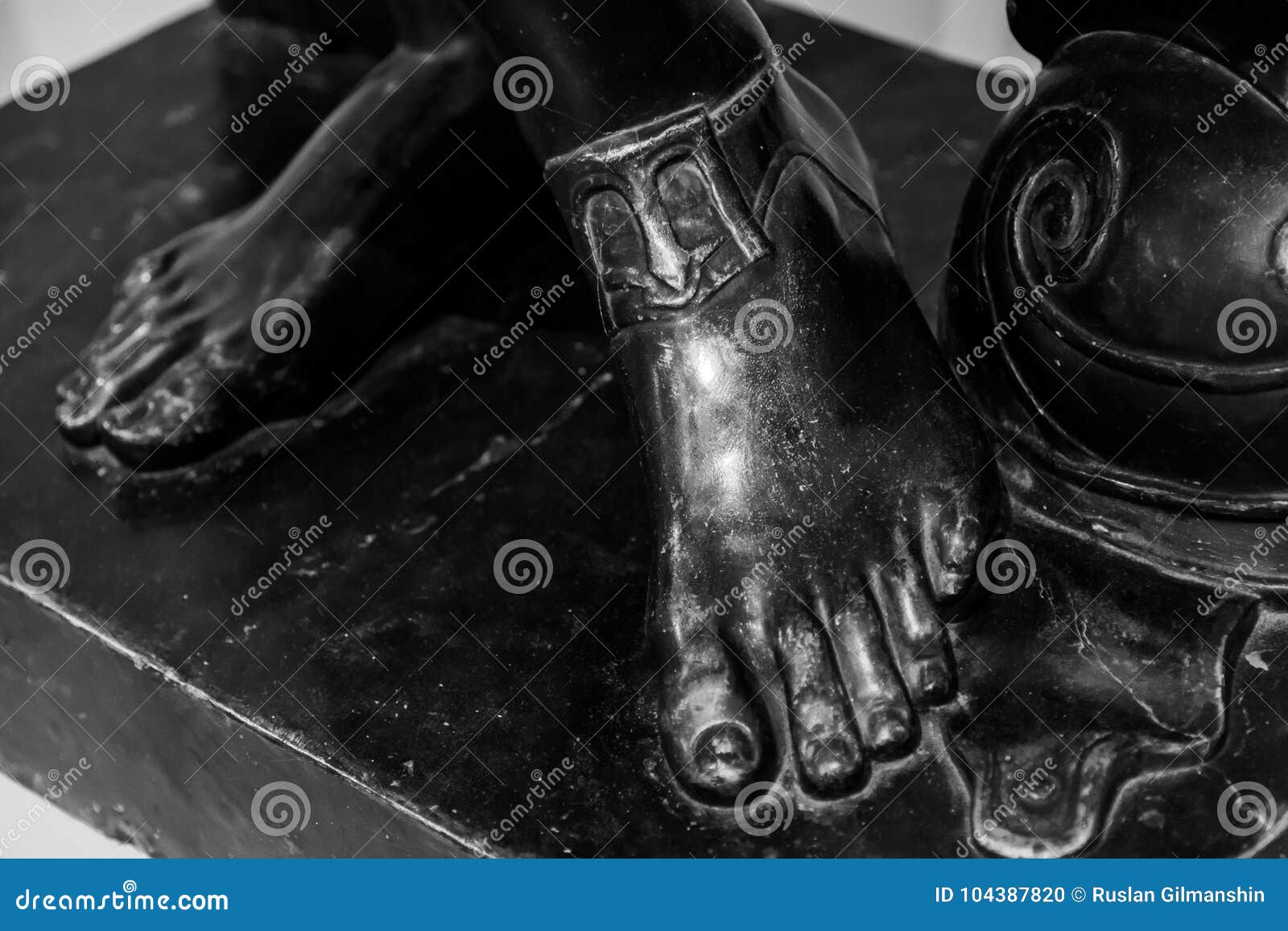 Feet of an ancient statue stock photo. Image of classic - 104387820