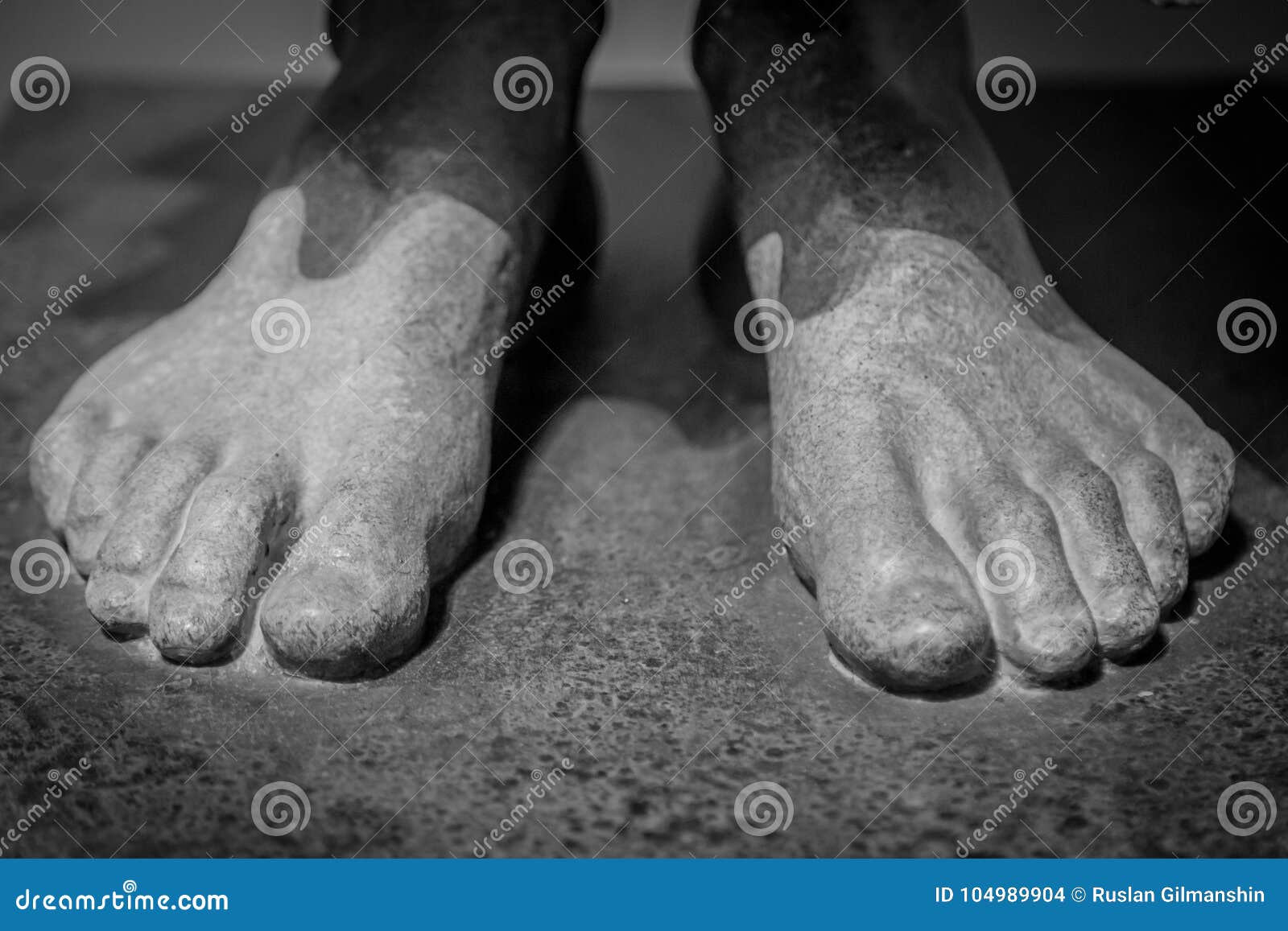 Feet of an ancient statue stock photo. Image of fingers - 104989904