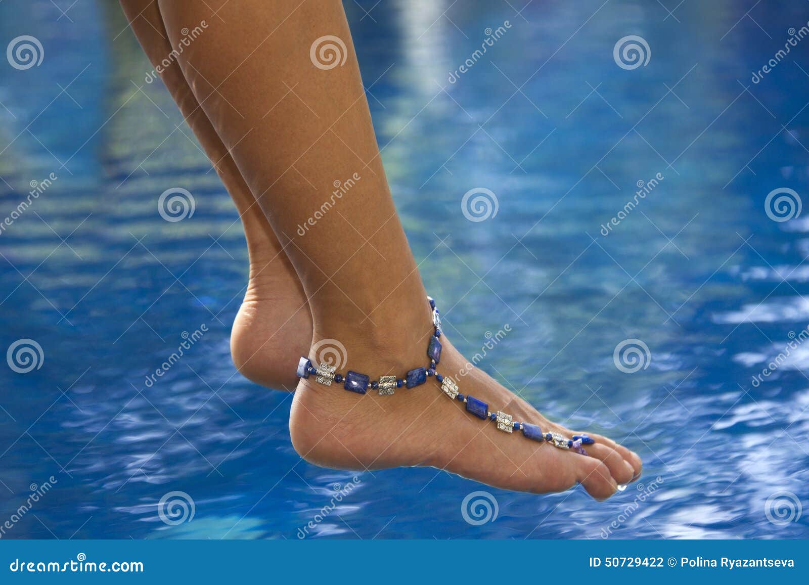 Feet with Ankle Bracelet Above the Pool Stock Photo - Image of stone ...