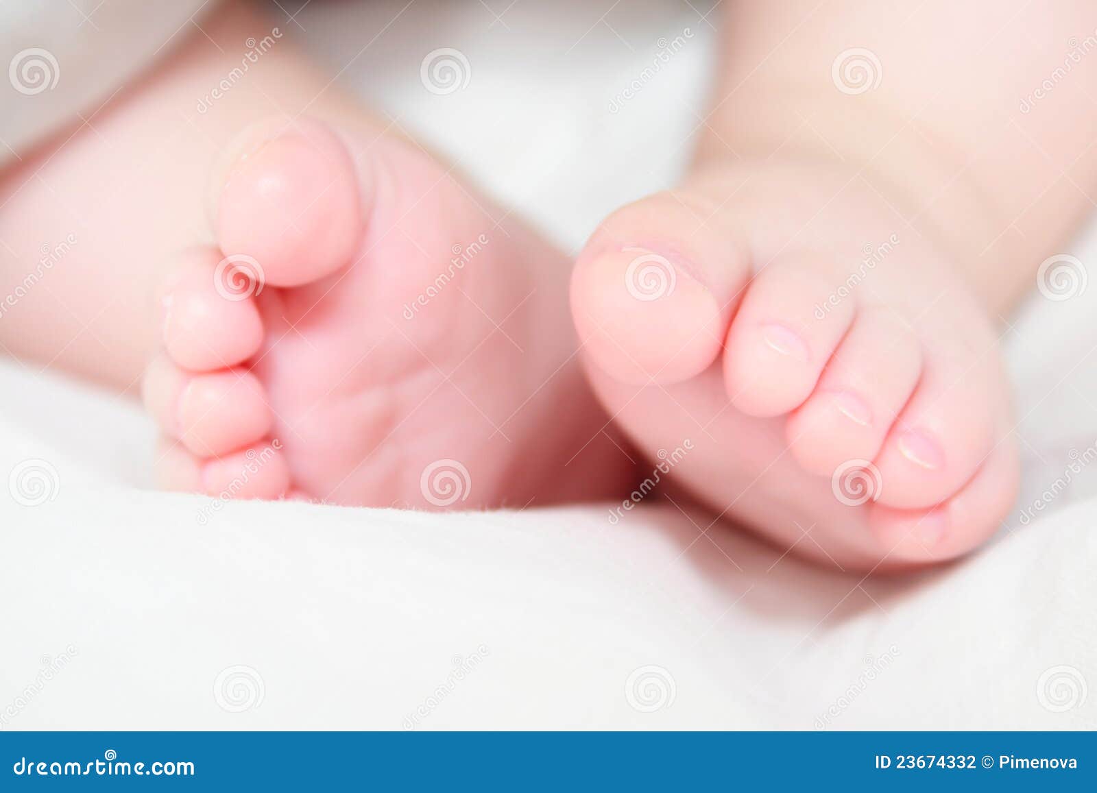 Feet of the baby stock photo. Image of human, foot, contrasts - 23674332