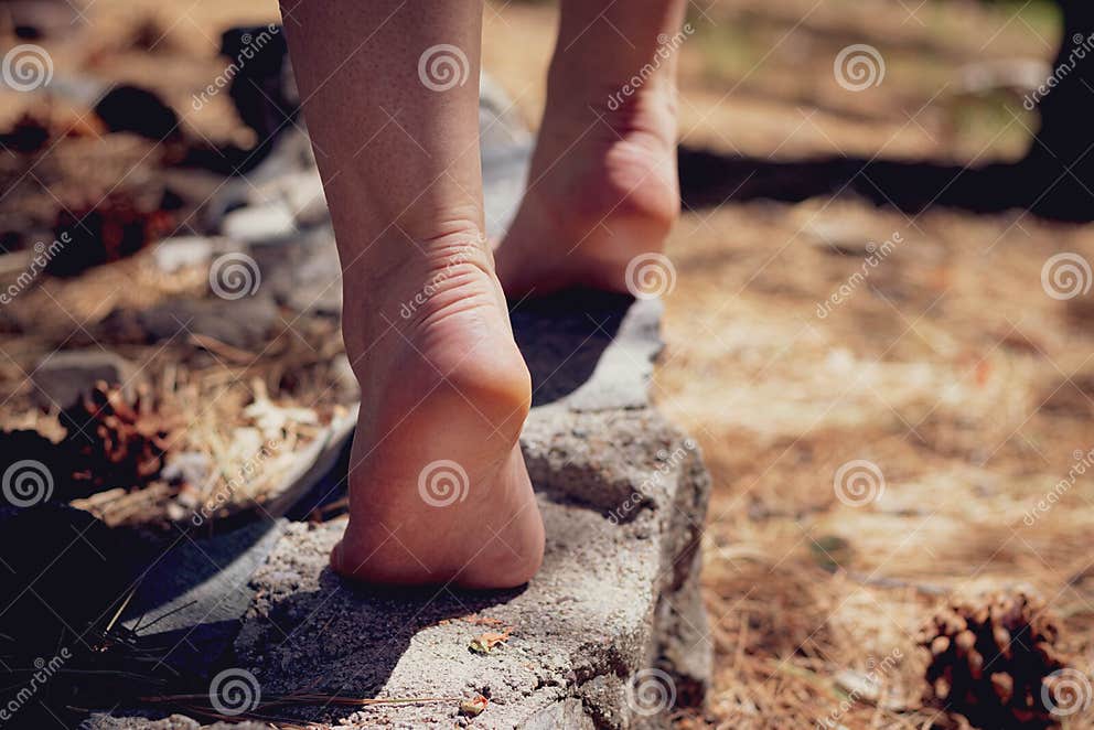 Feet on Stone Wall stock photo. Image of woman, careful - 245383482
