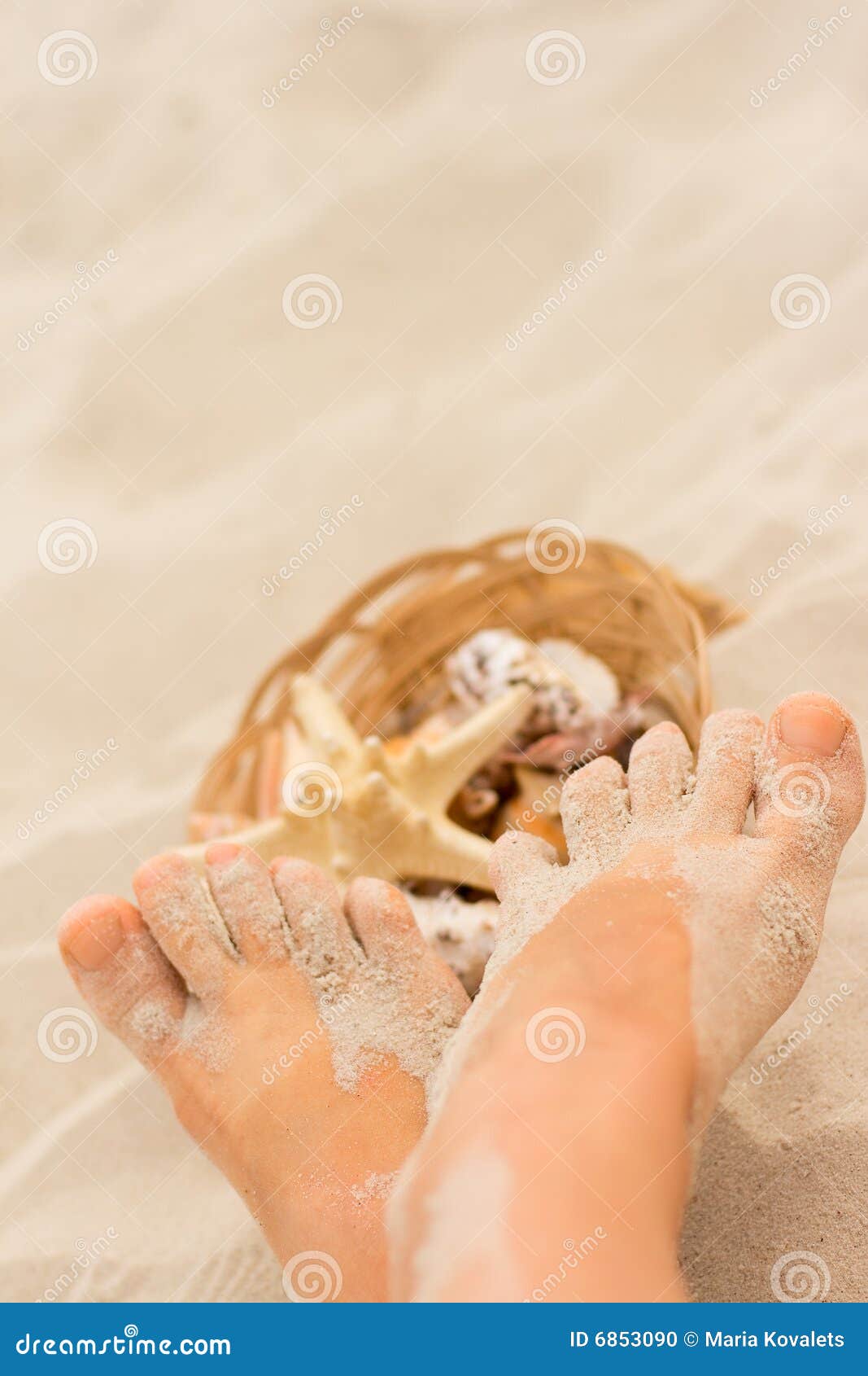 Feet and basket of shells stock photo. Image of souvenir - 6853090