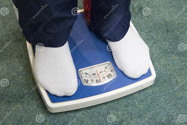 Feet on bathroom scale stock photo. Image of balance, isolated - 2243482