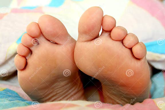 Feet in Bed stock image. Image of toes, toenails, relax - 4402949
