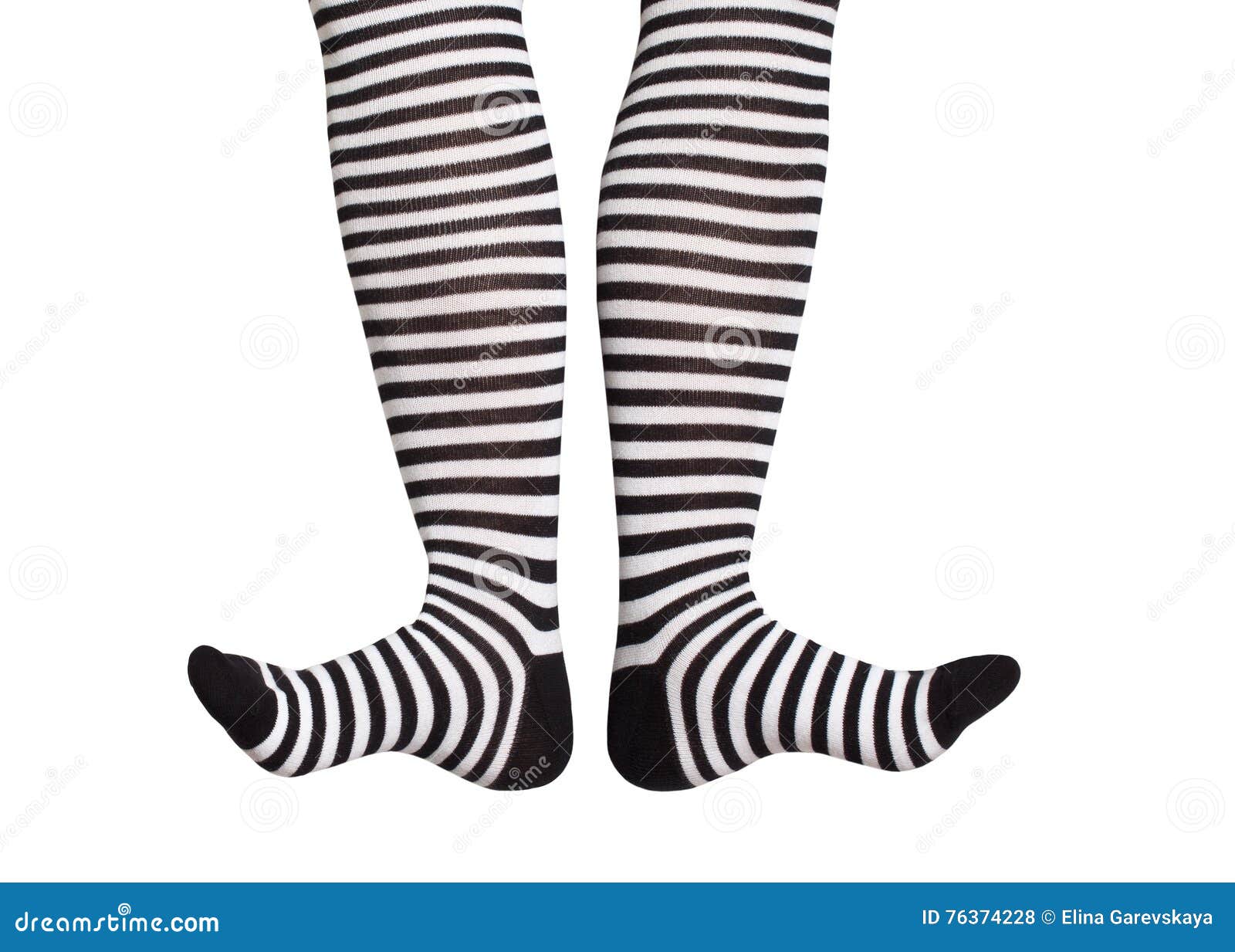 Feet in Black-and-white Striped Socks Stock Photo - Image of right ...