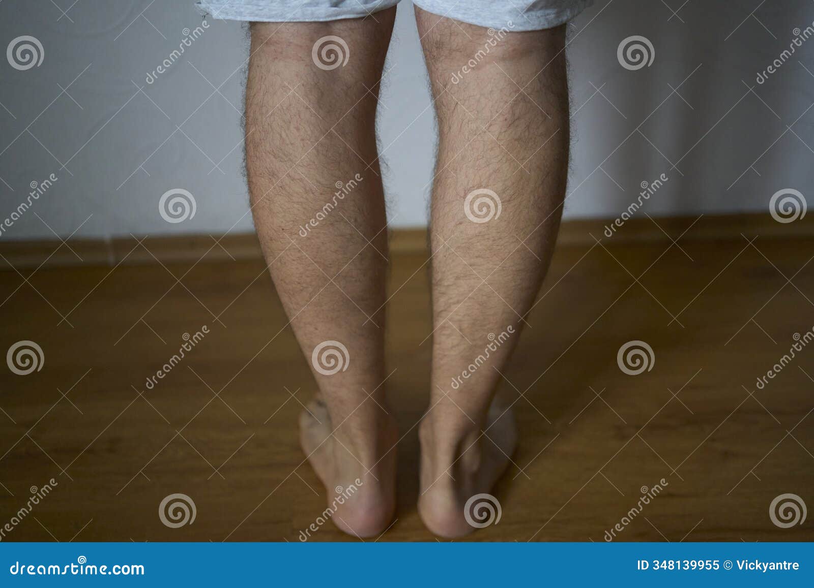 The Feet and Calves of a Man from Behind Stock Image - Image of holding ...
