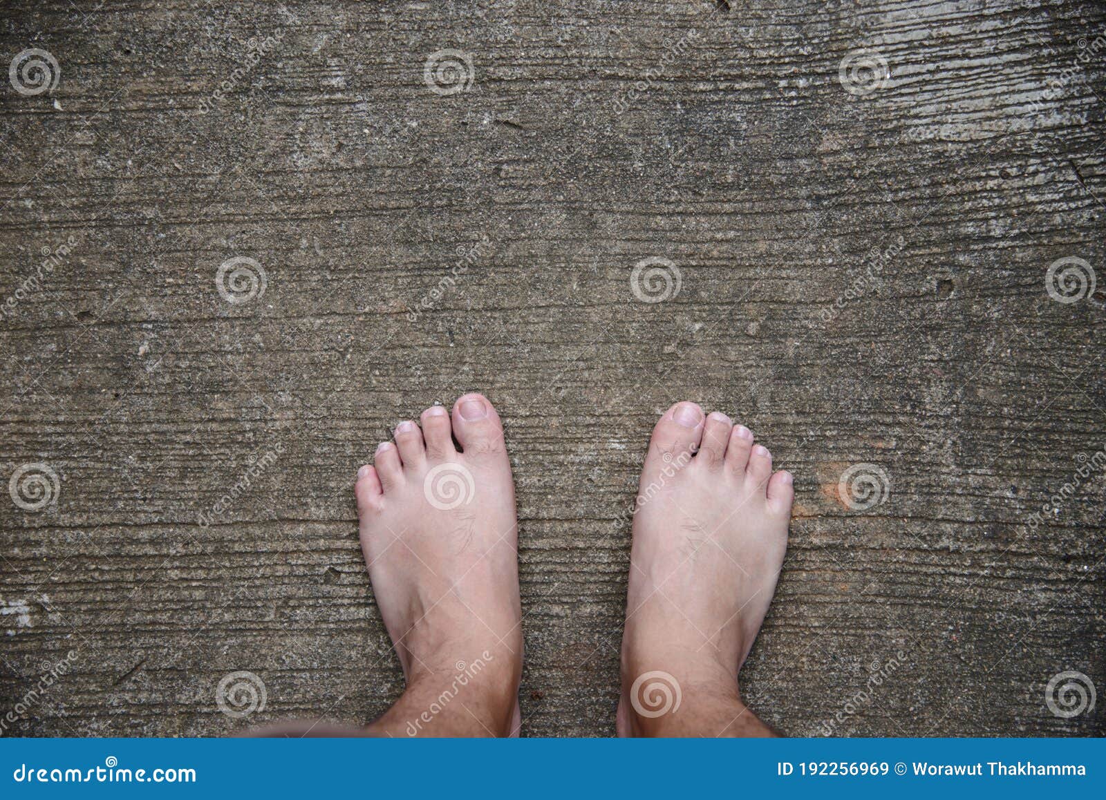 Feet on the cement ground. stock image. Image of cement - 192256969