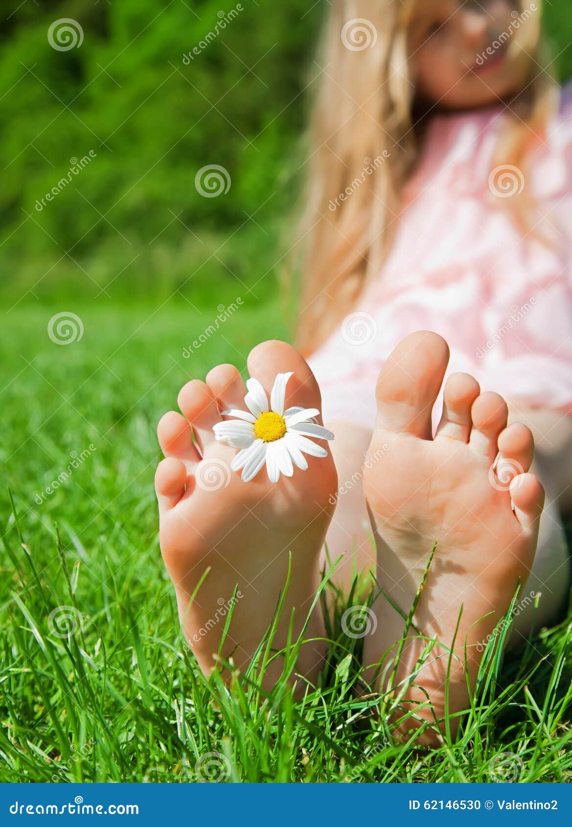 Feet of a Child with Flower Stock Photo - Image of happy, nature: 62146530