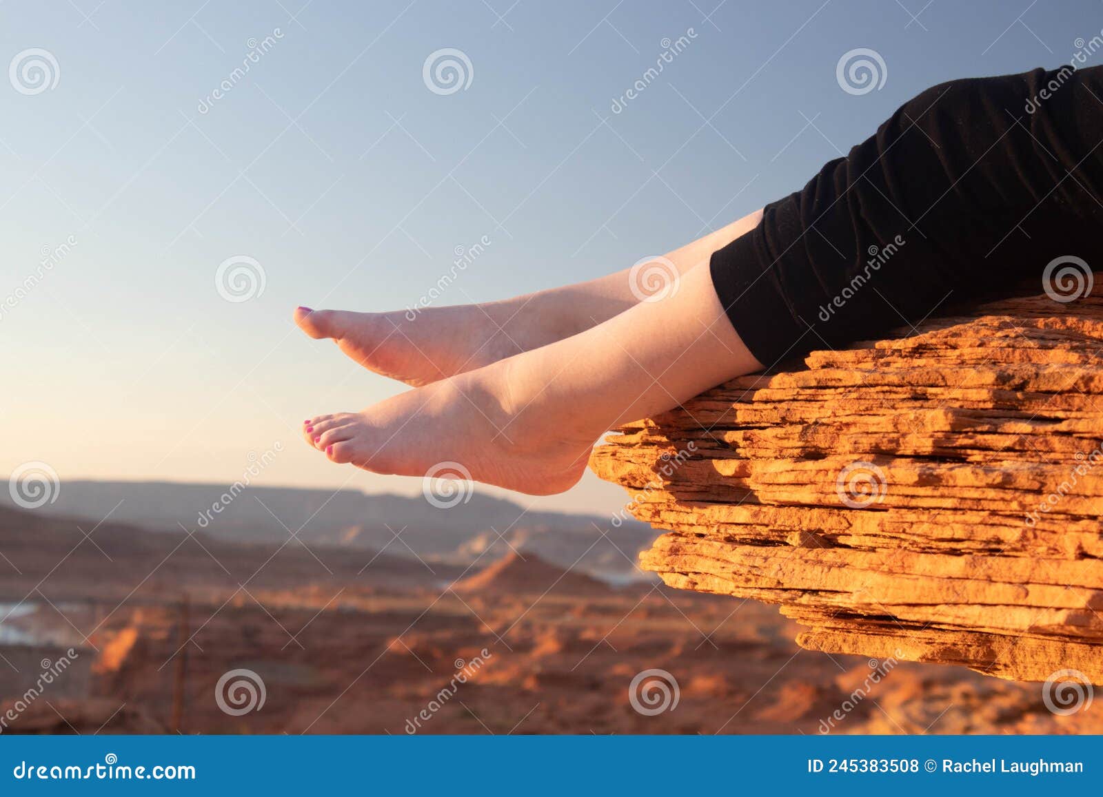 Feet on Cliff at Canyon stock photo. Image of legs, foot - 245383508