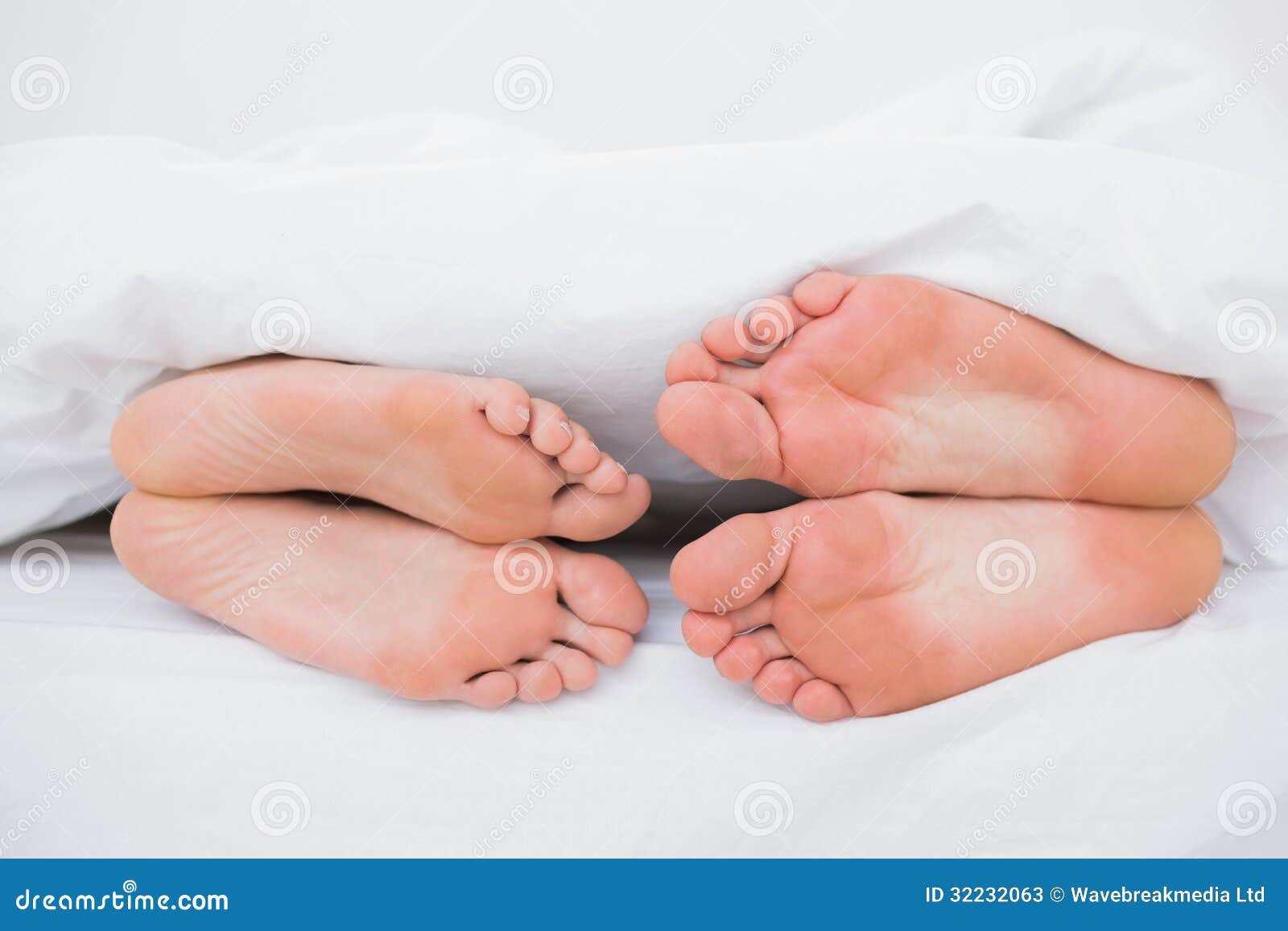 Feet of a Couple Face To Face in Bed Stock Image - Image of resting ...
