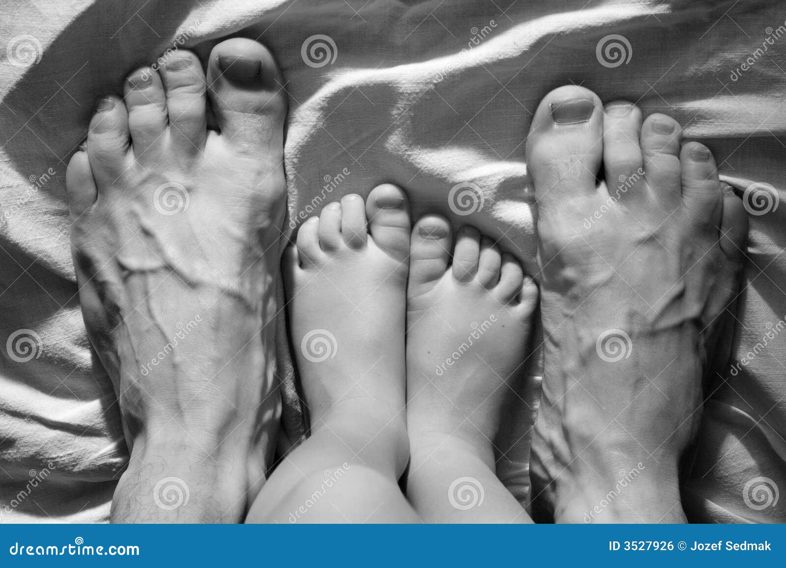 Feet of dad and daughter stock photo. Image of light, body - 3527926