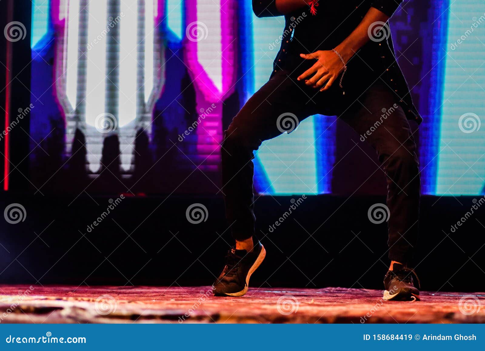 Feet of a Dancer on Stage Doing Hip Hop Dancing Stance with Background ...