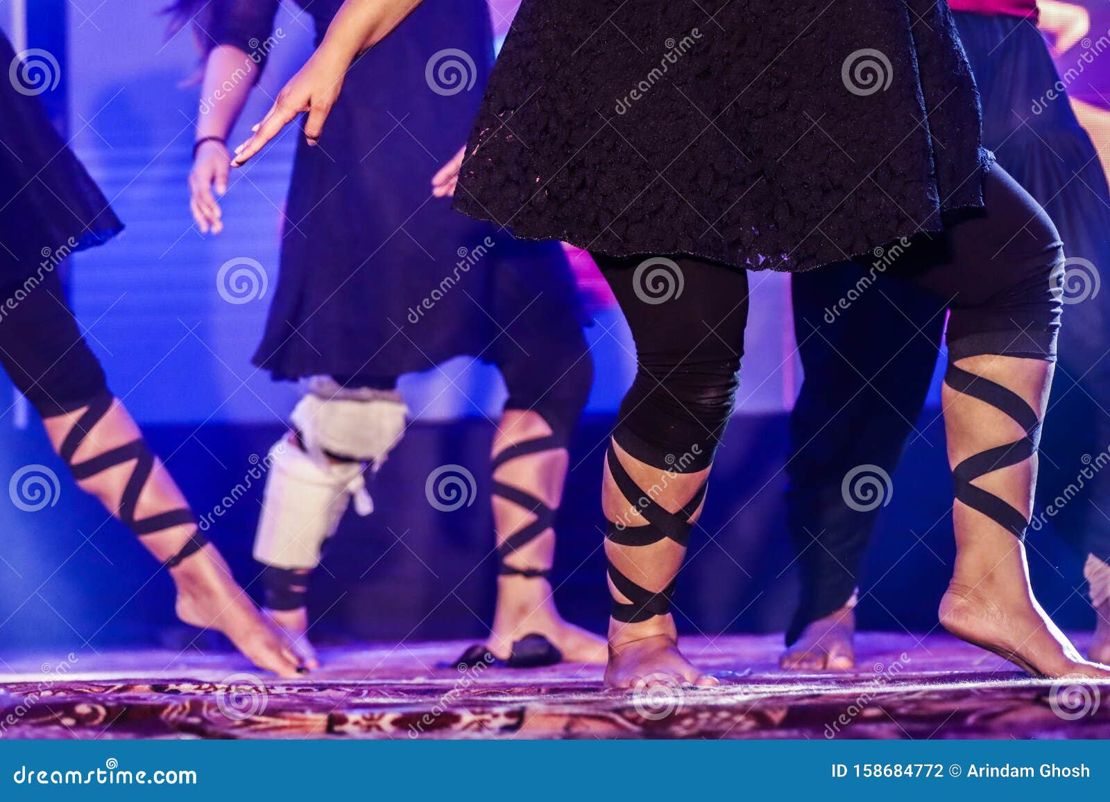 Feet of a Dancer on Stage Doing Hip Hop Dancing Stance with Background ...