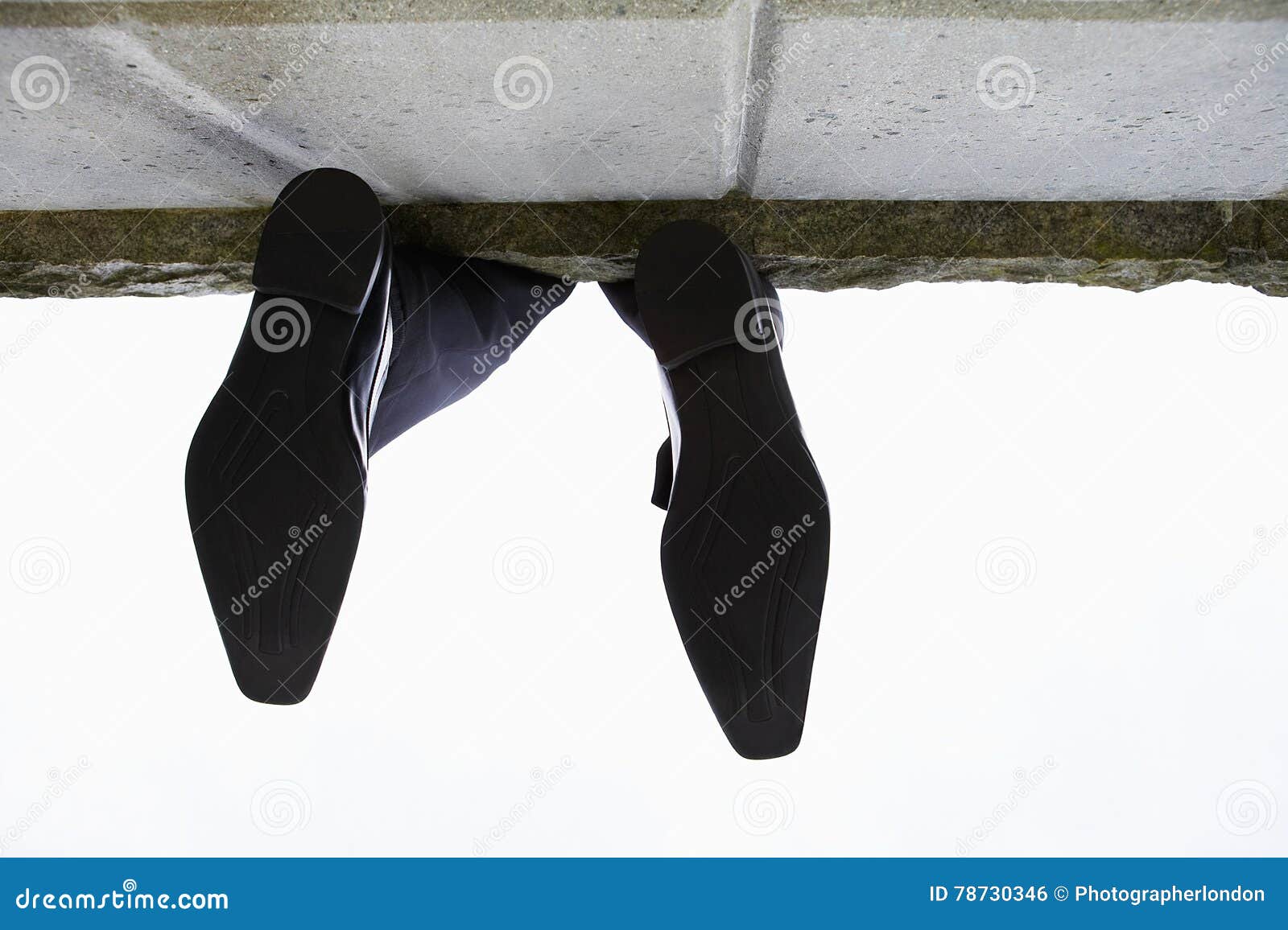 Feet Dangling Over Wall, Low Angle View Stock Photo - Image of ...