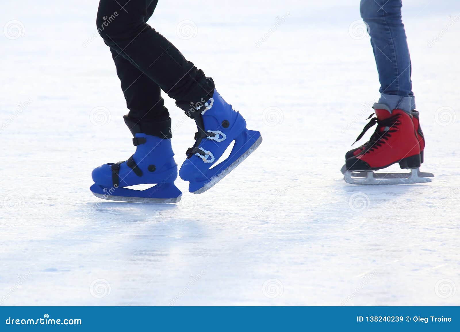 Feet of Different People Skating on the Ice Rink Stock Image - Image of ...