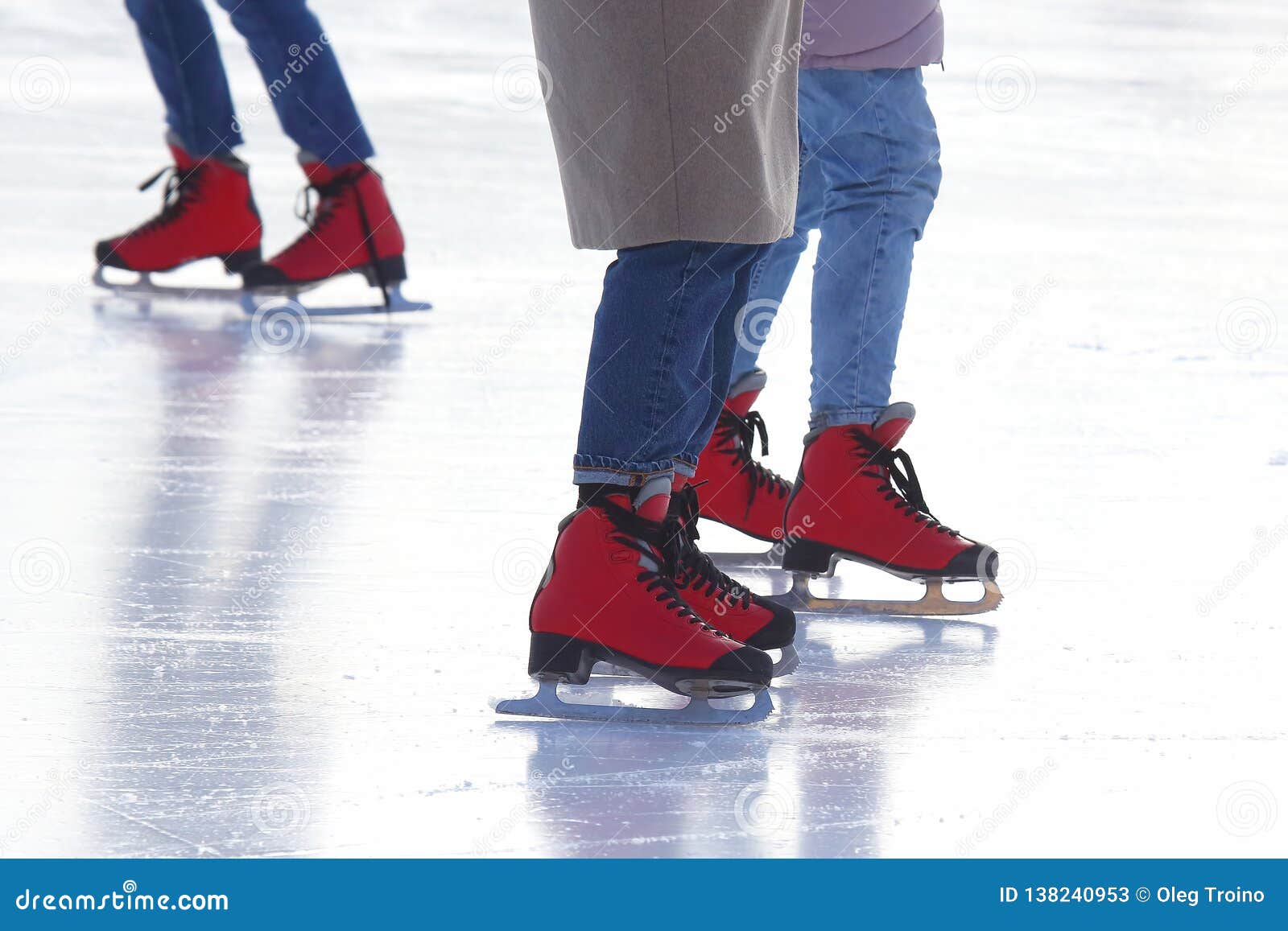 Feet of Different People Skating on the Ice Rink Stock Image - Image of ...