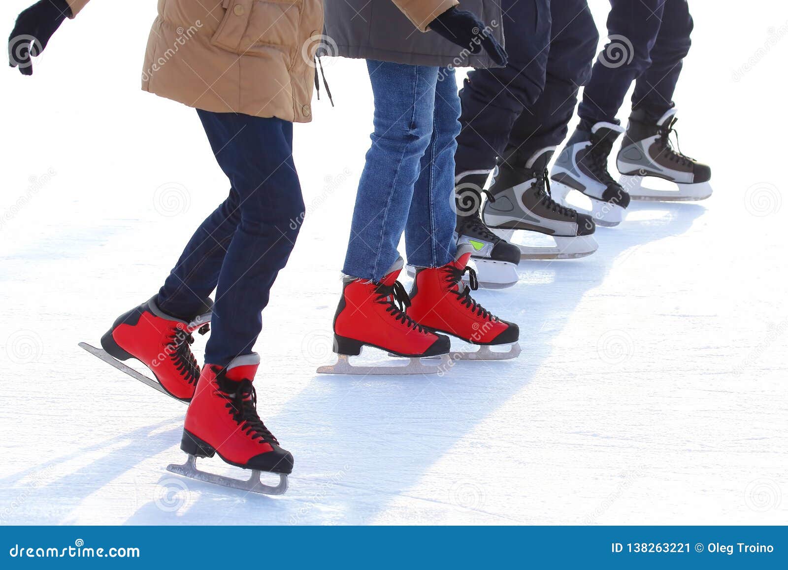 Feet of Different People Skating on the Ice Rink Stock Image - Image of ...
