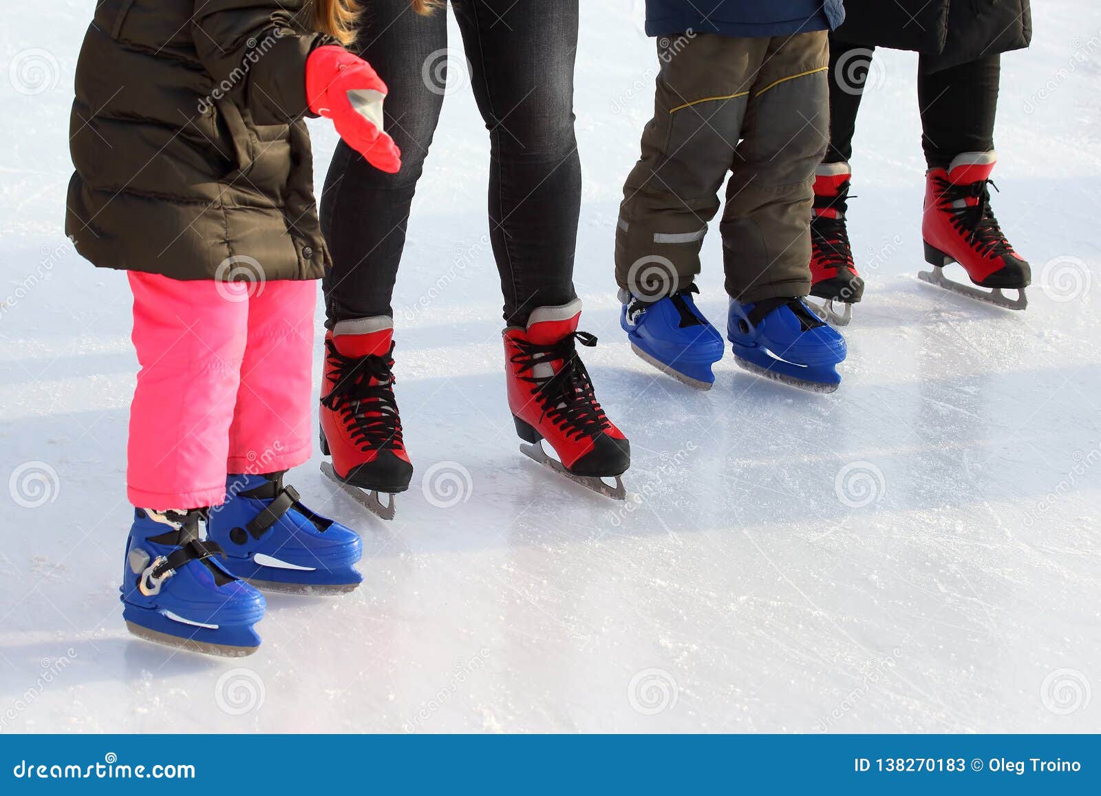 Feet of Different People Skating on the Ice Rink Stock Image - Image of ...