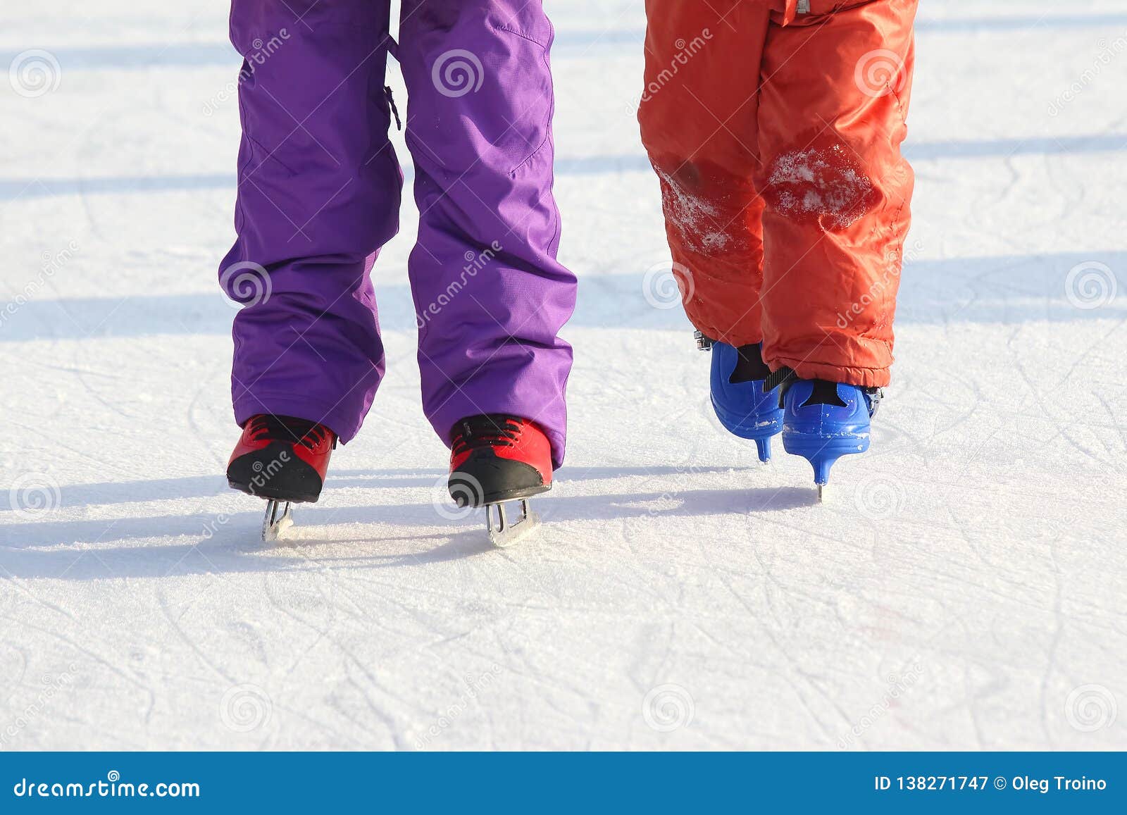 Feet of Different People Skating on the Ice Rink Stock Image - Image of ...