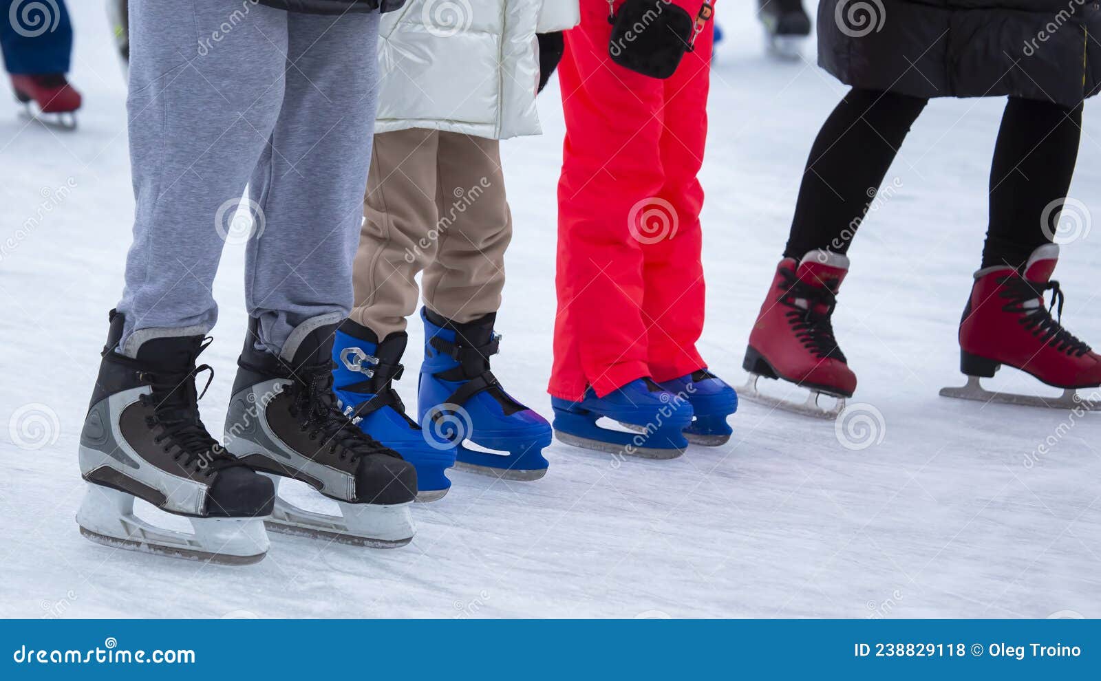 Feet of Different People Skating on the Ice Rink Stock Photo - Image of ...