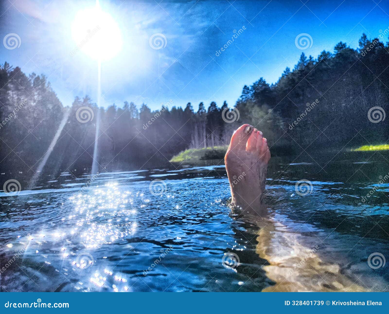 A Feet Float in Clear Blue Lake Water Under a Bright, Sunny Sky Stock ...