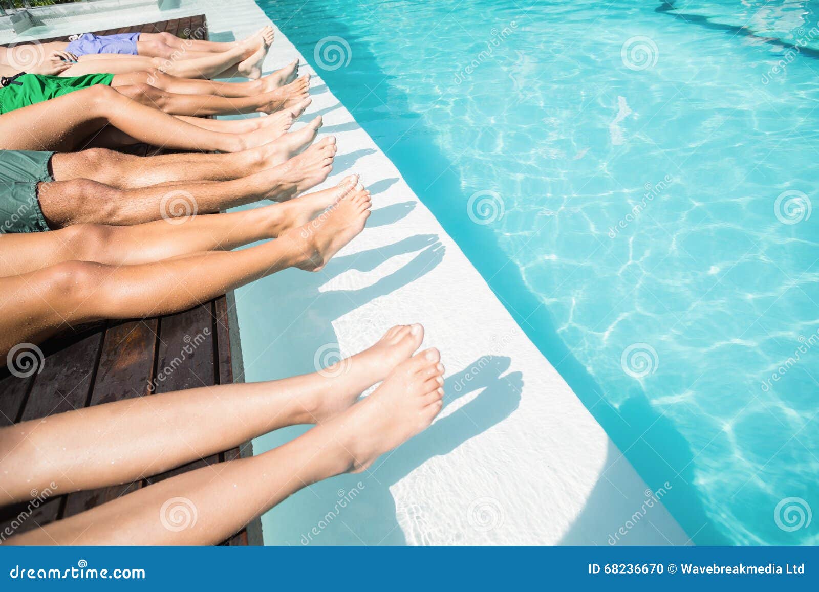 Feet of Friends Relaxing at Poolside Stock Photo - Image of people ...