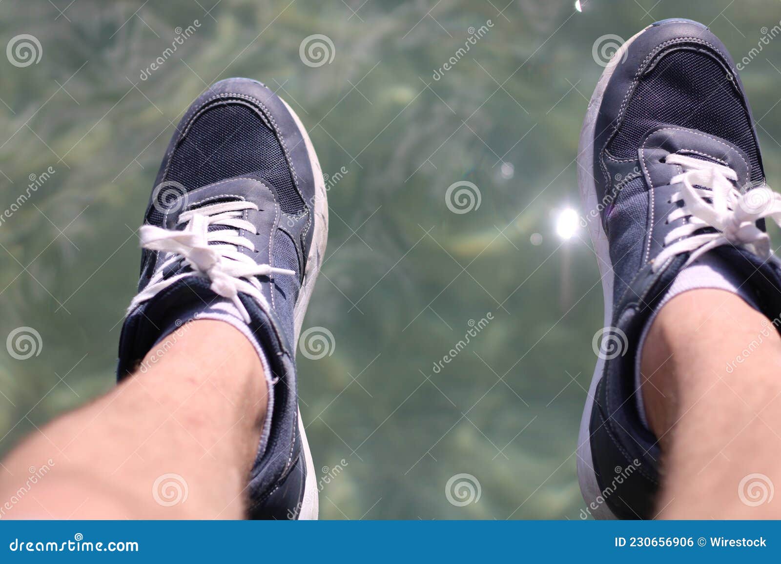 Feet Hang Above Clear Water Stock Photo - Image of white, blue: 230656906