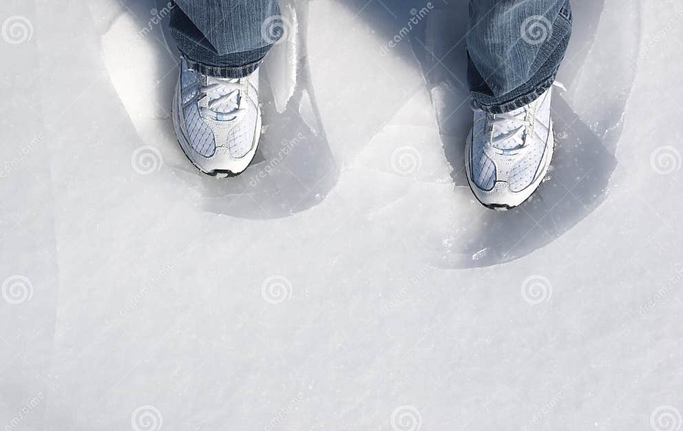 Feet in Ice and Snow stock photo. Image of cracks, denim - 17864850