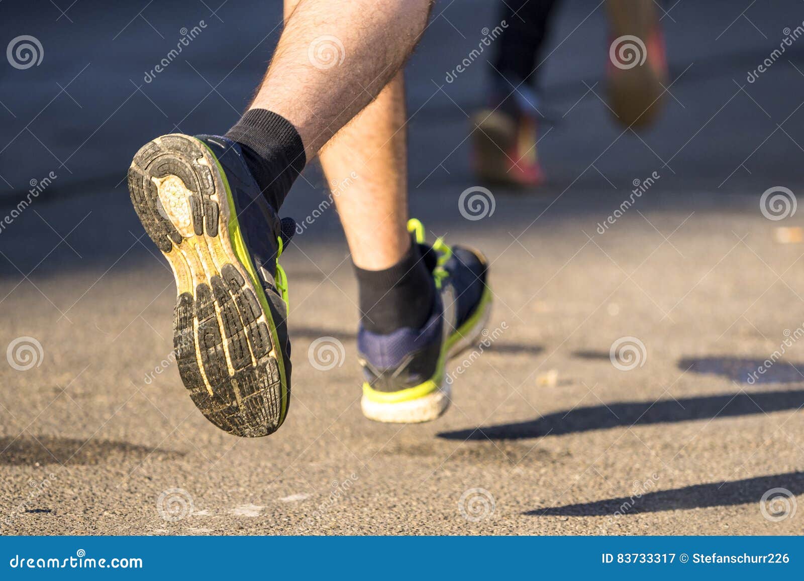 Feet of a jogger stock image. Image of athletic, outdoor - 83733317