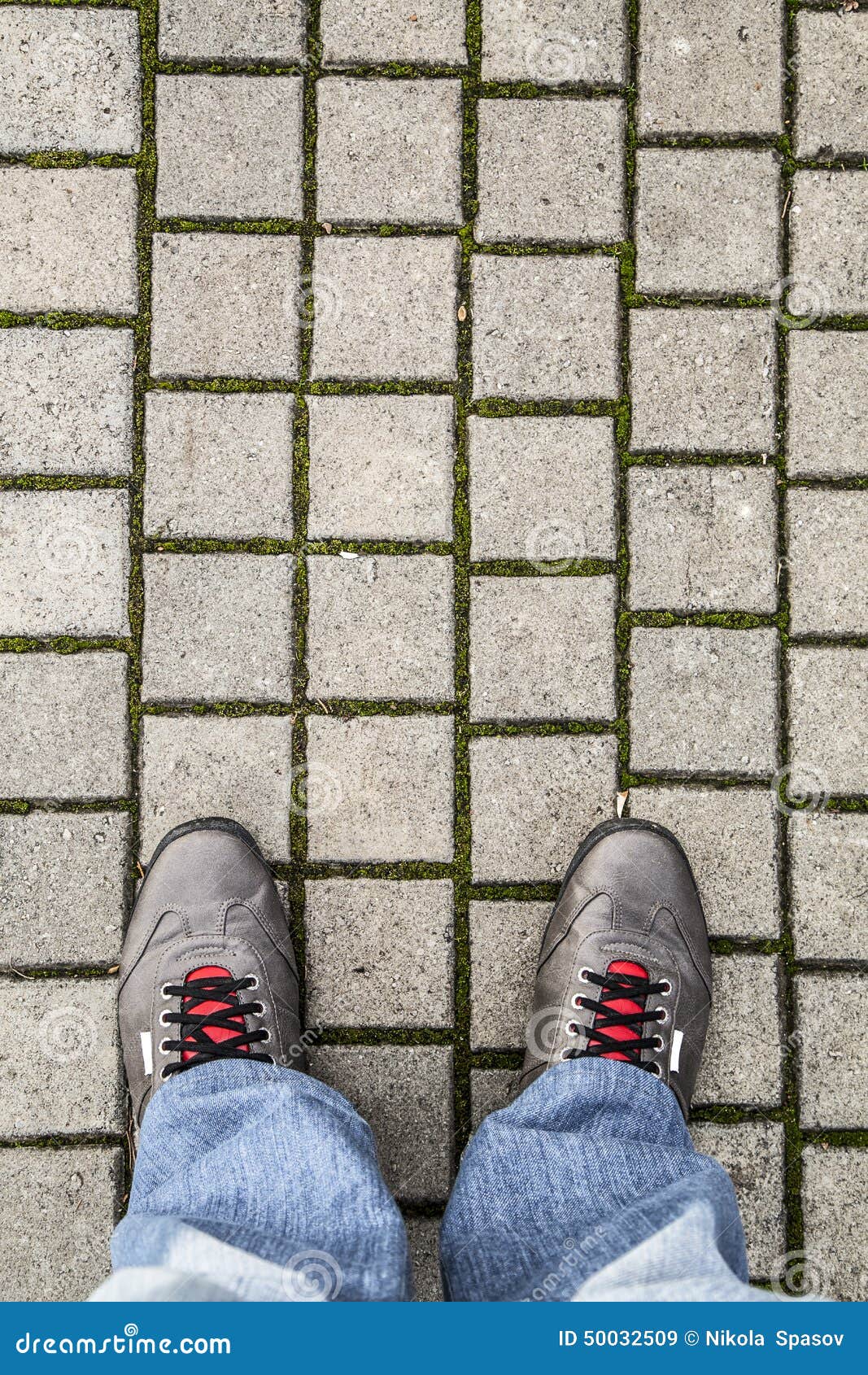 Feet of a Man on the Pavement Stock Image - Image of stone, lifestyle ...
