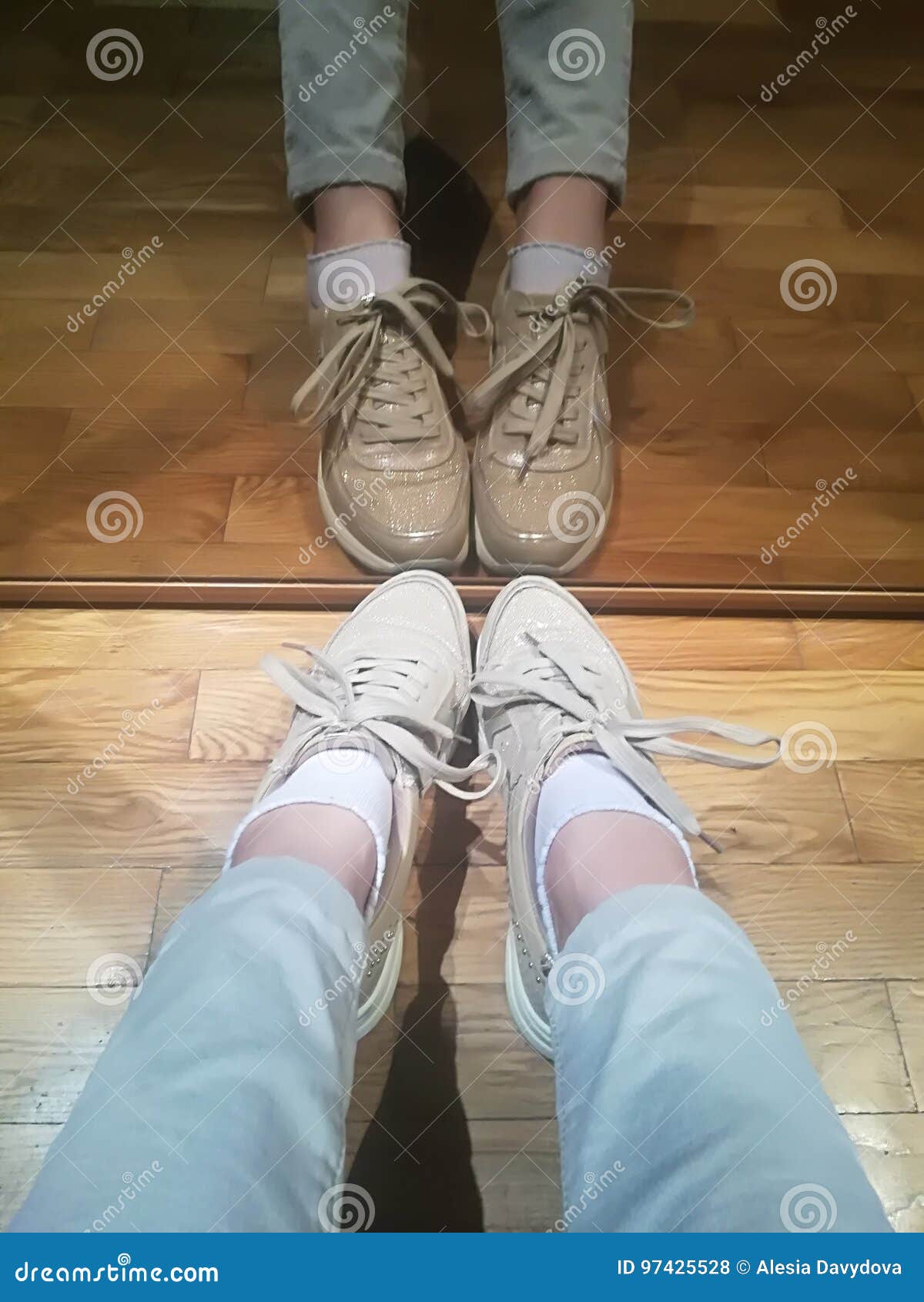 Feet in the mirror stock photo. Image of sneakers, footwear - 97425528