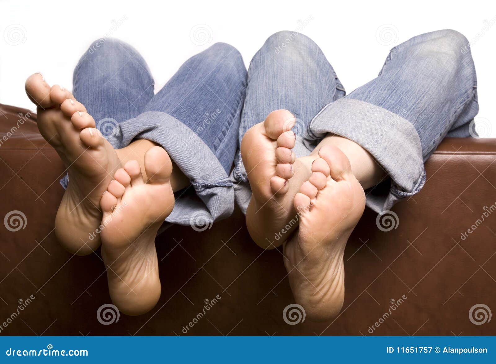 Feet over back of couch stock image. Image of pairs, back - 11651757