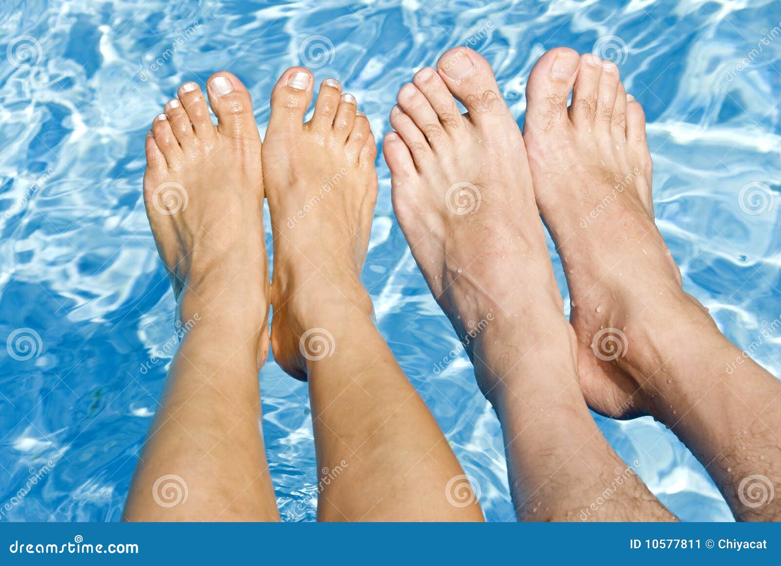 Feet Over the Swimming Pool Stock Image - Image of water, blue: 10577811