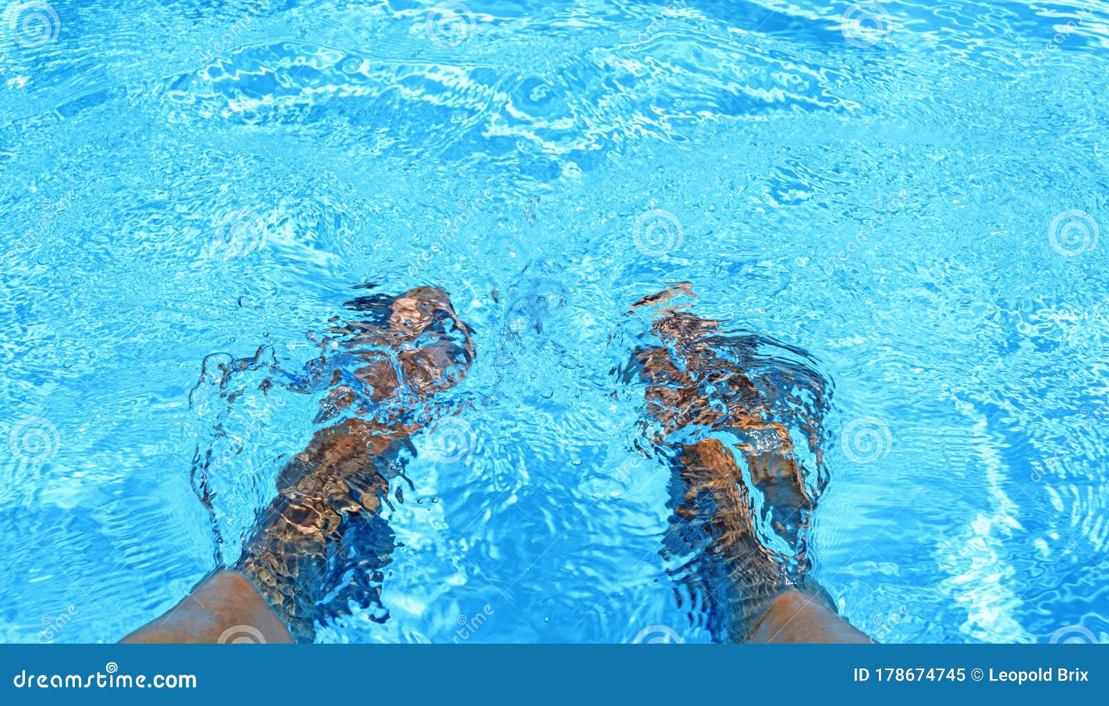 Two feet in a blue pool stock image. Image of dipping - 178674745