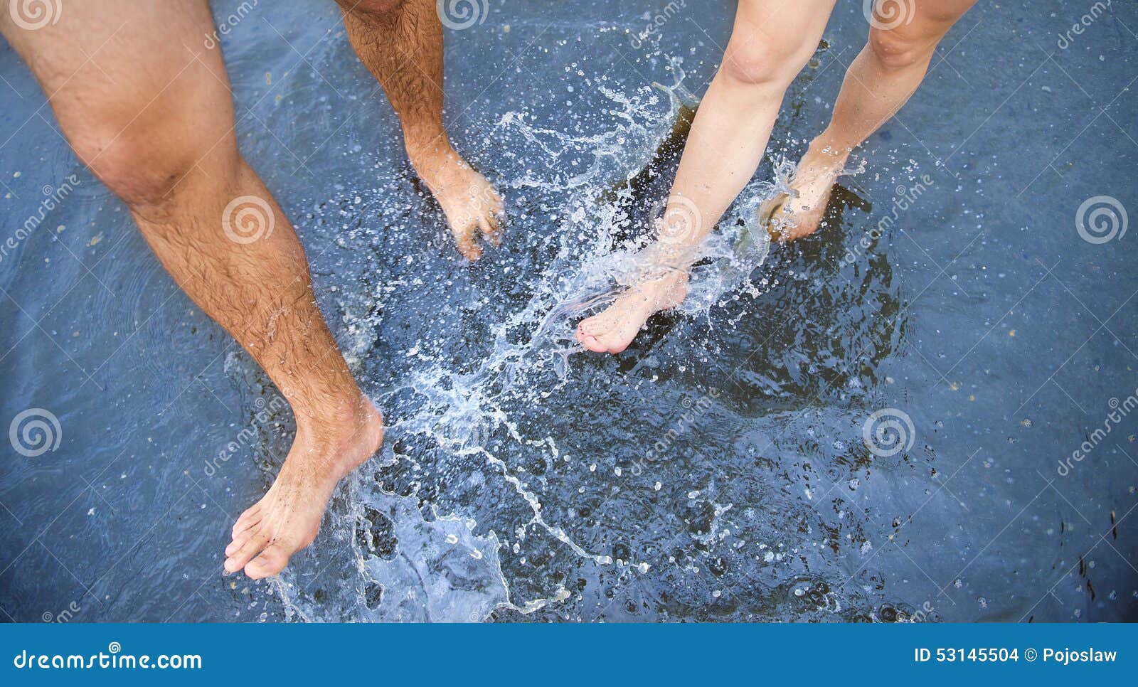 Feet in puddle stock photo. Image of relationship, rain - 53145504