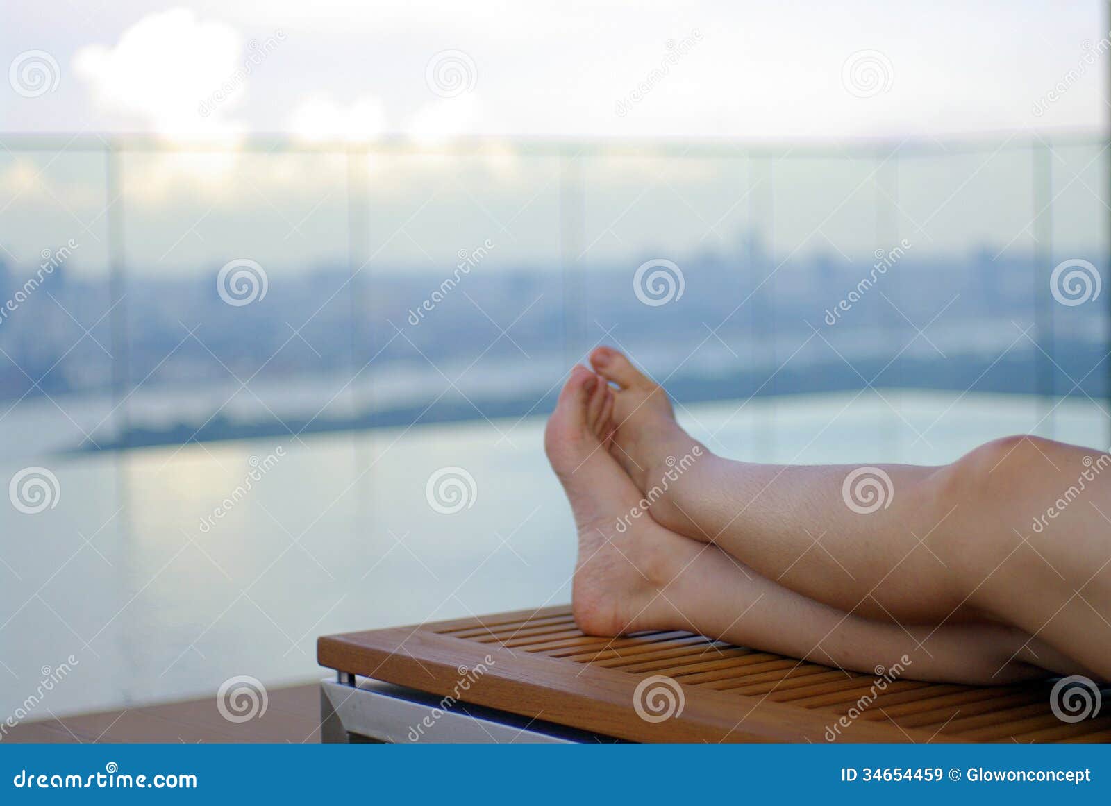 Feet relax at the pool stock image. Image of beach, background - 34654459