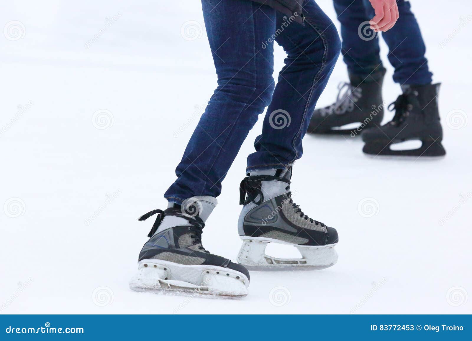 Feet Rolling on Skates Man on the Ice Rink Stock Image - Image of ...
