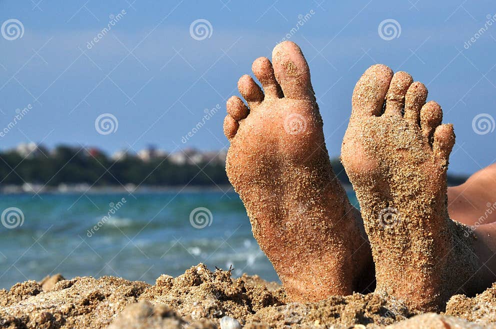 Feet in sand stock photo. Image of pair, fingers, skin - 10419346