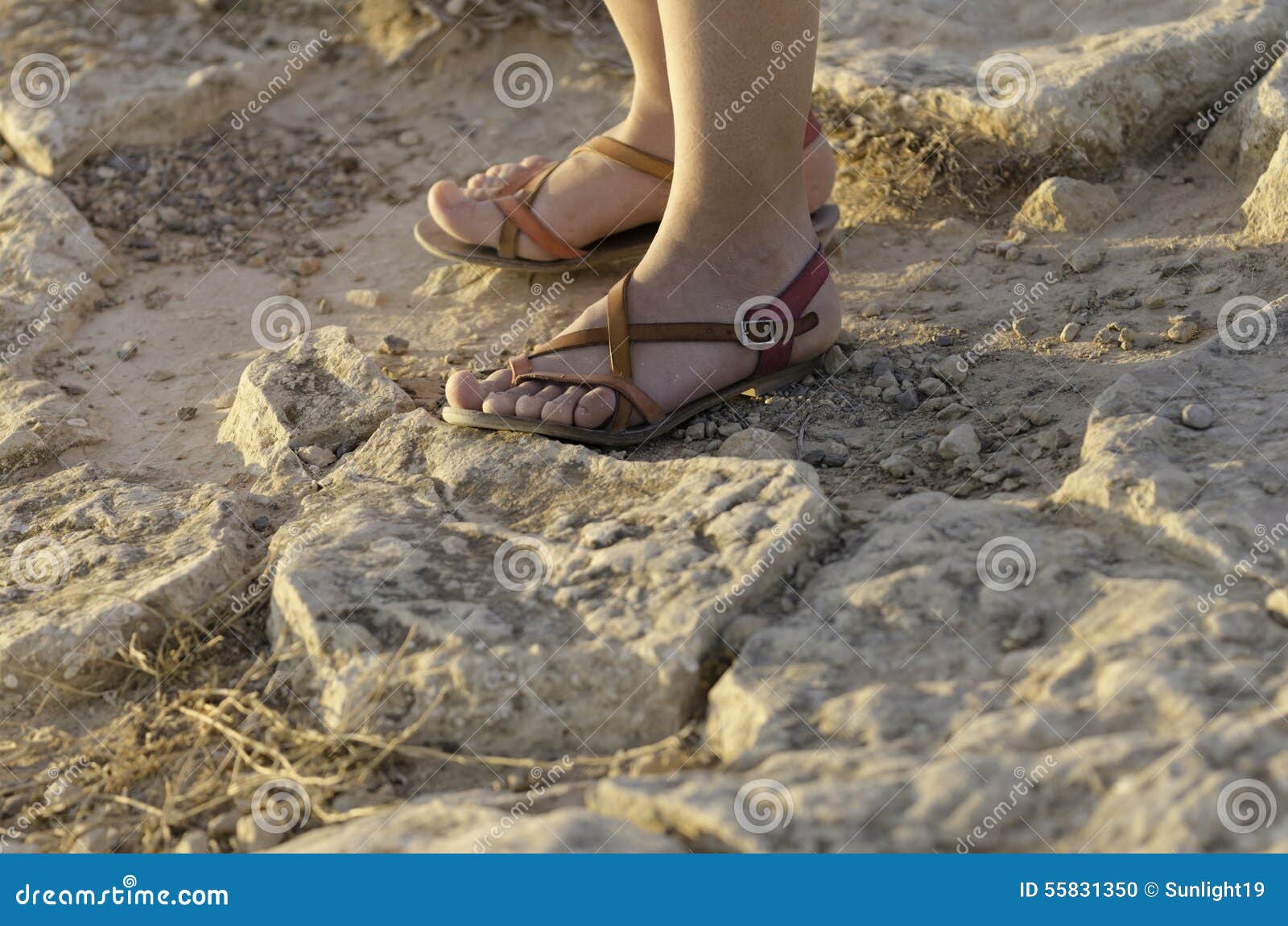 Feet with Sandals on the Rock. Stock Photo - Image of model, balearic ...