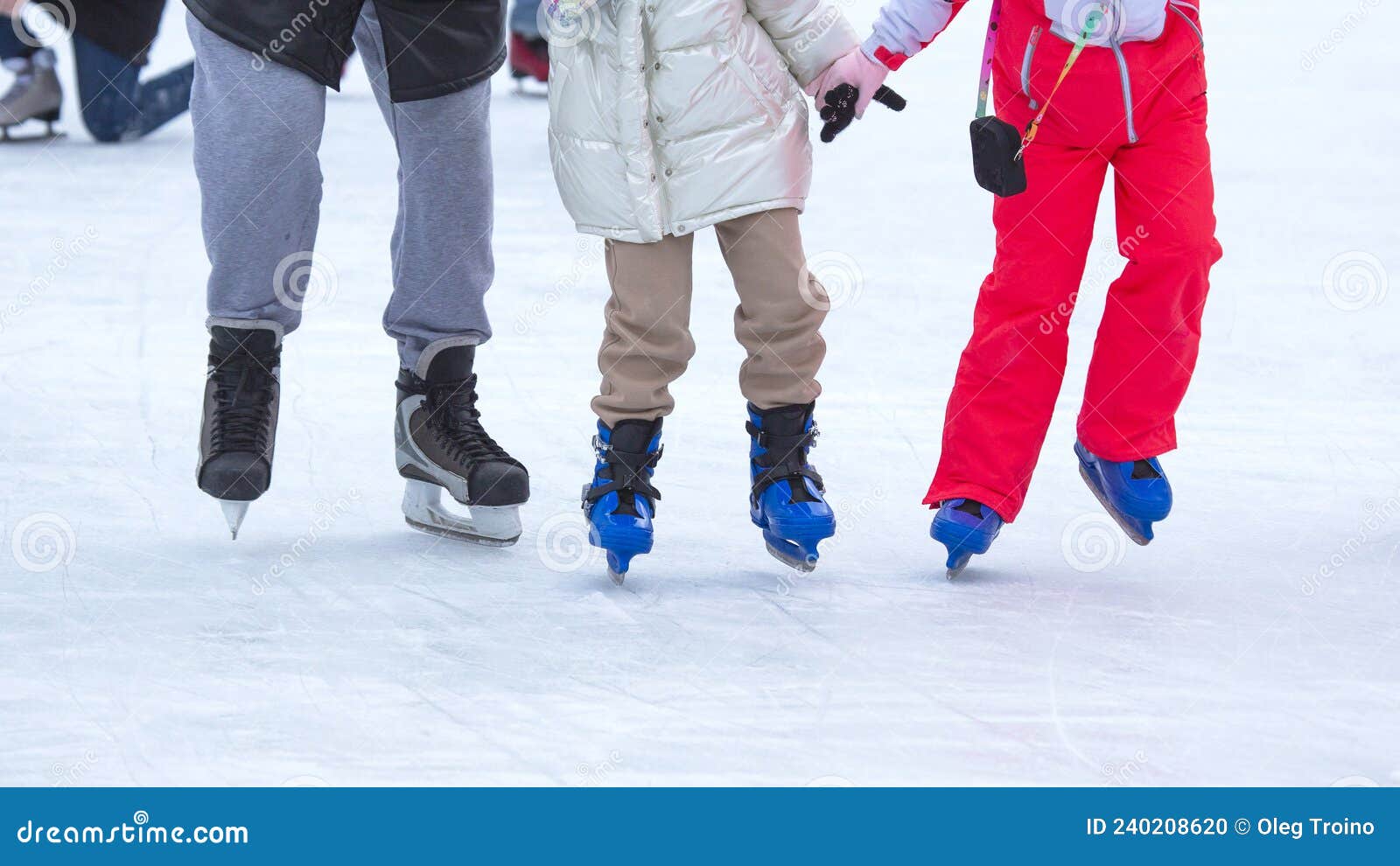 Feet on the Skates of a Person Rolling on the Ice Rink Stock Photo ...