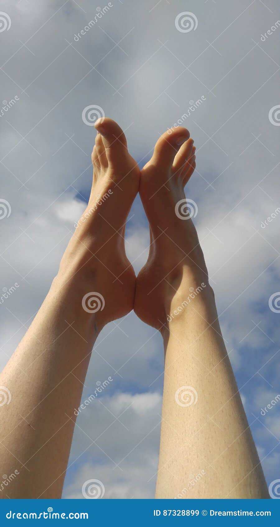 Feet in sky stock image. Image of neck, girl, thumb, calf - 87328899