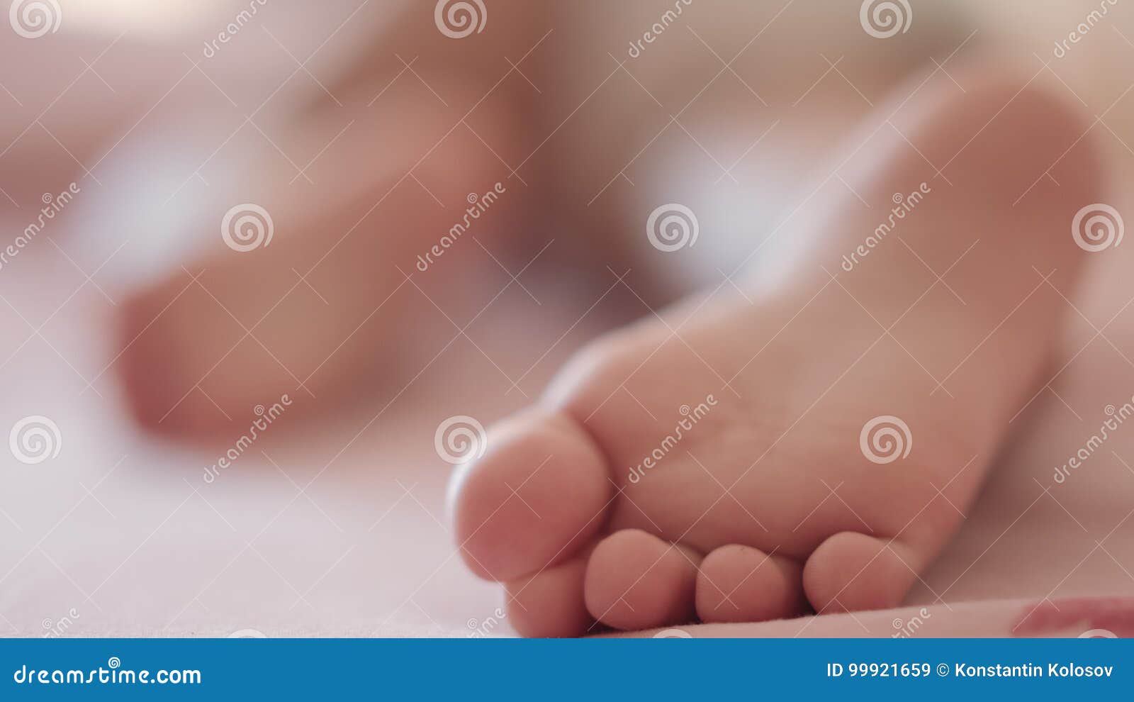 Feet of a sleeping child. stock video. Video of body - 99921659