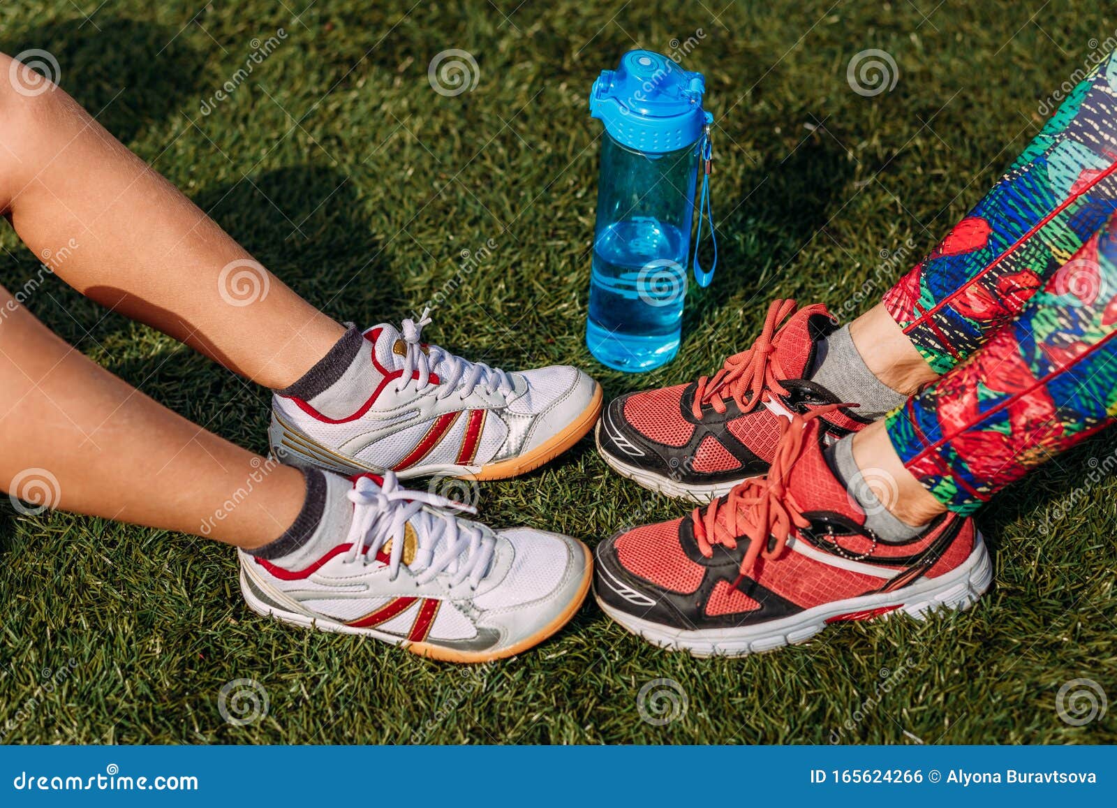 Feet in Sneakers and a Bottle of Water Stock Photo - Image of female ...